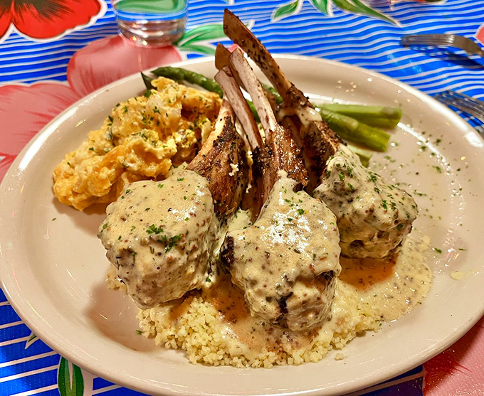 These lamb chops aren't just dinner; they're a masterclass in how to treat good meat with respect. The mushroom cream sauce deserves its own fan club. 