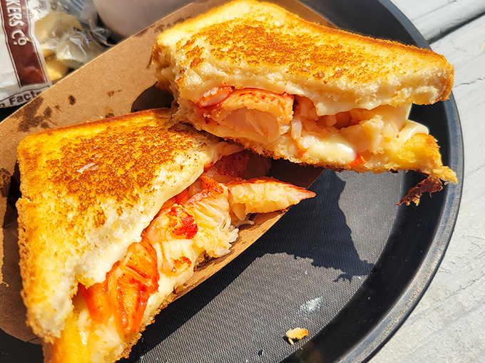 The lobster grilled cheese that haunts your dreams &ndash; where childhood comfort food meets grown-up indulgence in a golden, crispy package.