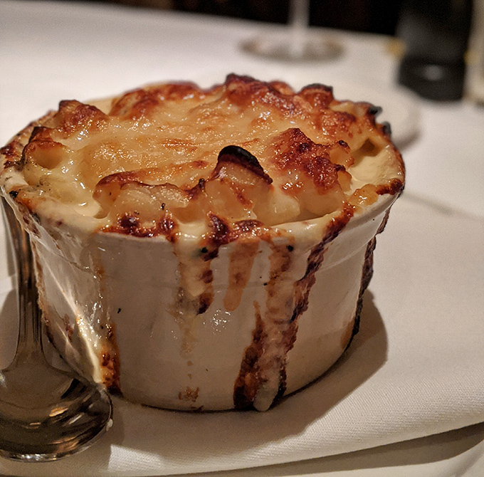 Mac and cheese that's had a glow-up. This isn't the stuff from the blue box; it's what that blue box dreams of becoming.