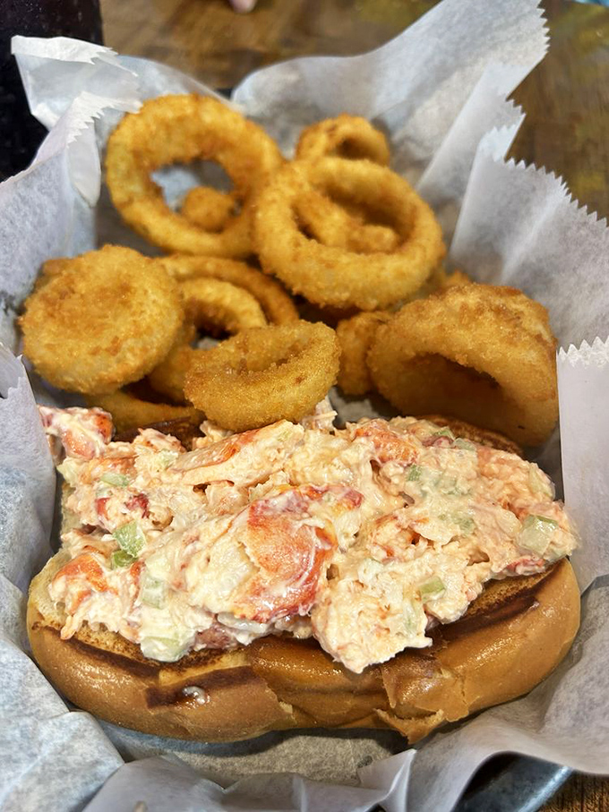The lobster roll that launched a thousand road trips. Chunks of sweet lobster meat nestled in a buttery roll with crispy onion rings standing guard.