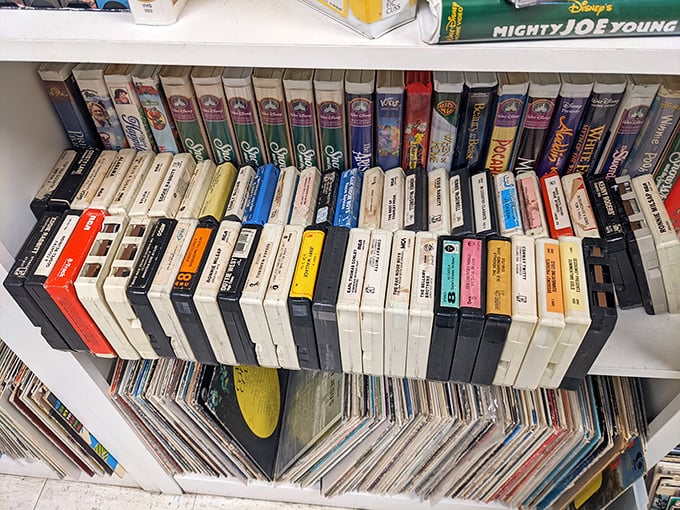 VHS tapes standing at attention, ready to transport you back when rewinding was part of movie night.