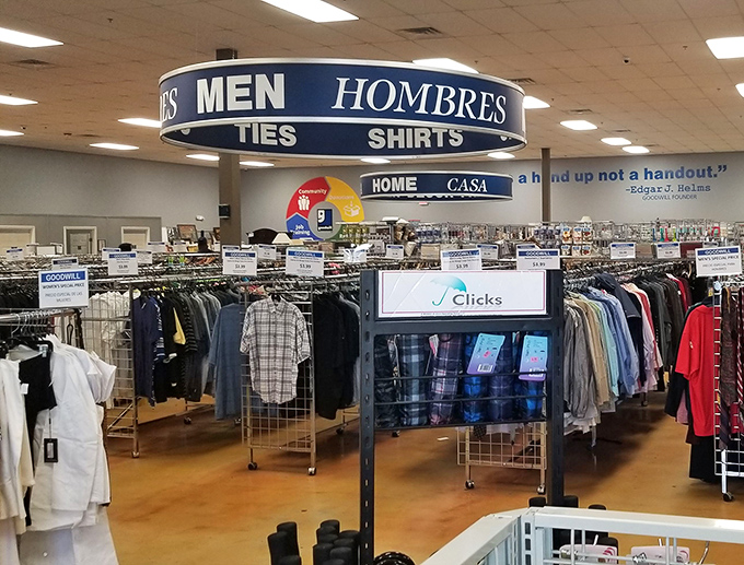 The men's department: where dress shirts that once attended board meetings now wait for their next adventure at prices that make your wallet smile.