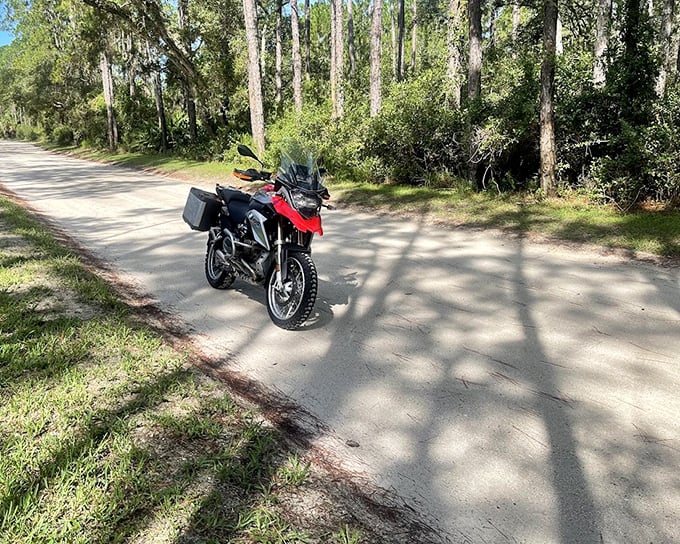 Some trails are meant for two wheels. This motorcycle enthusiast found the perfect shady path for a Florida adventure.