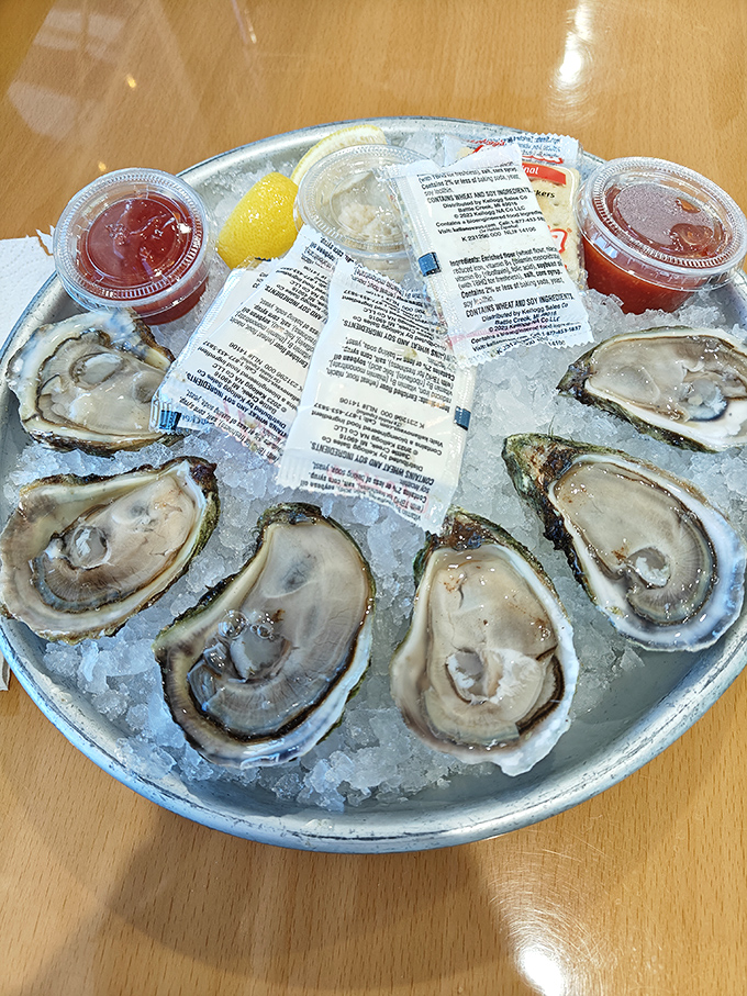 These oysters aren't just served—they're presented like the maritime jewels they are, with all the accoutrements a proper bivalve deserves.