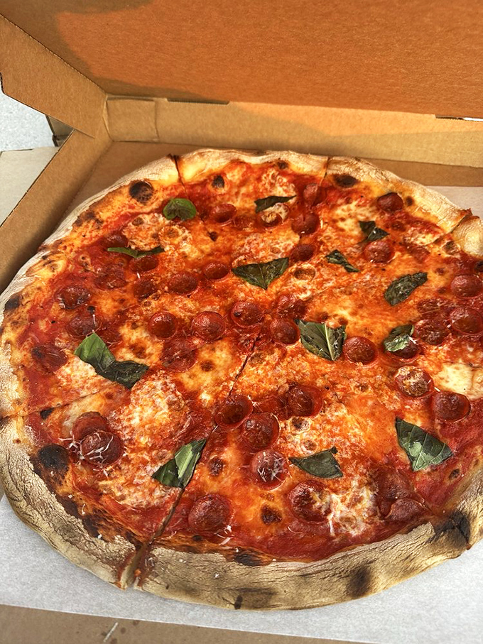 This pepperoni pie doesn't just have toppings&mdash;it has personality. Those crispy-edged cups holding little pools of savory magic deserve their own fan club.