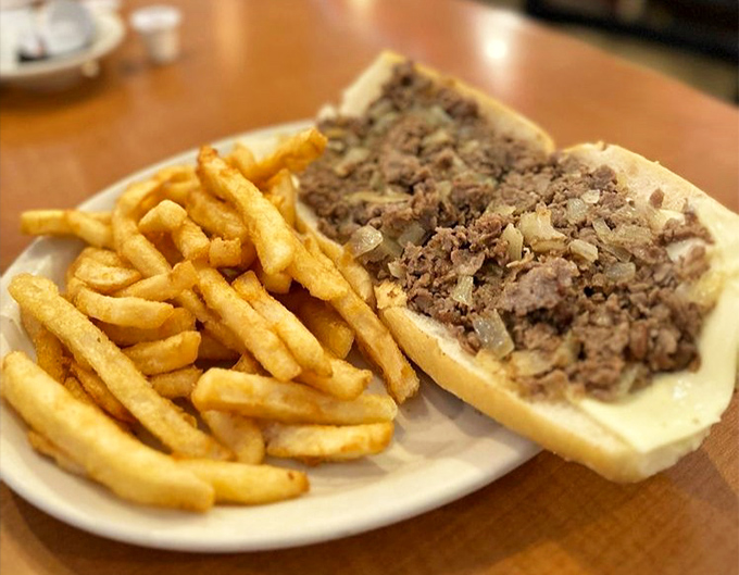 The holy trinity of Philadelphia dining: a perfect cheesesteak, golden fries, and the satisfaction of knowing lunch was money well spent.