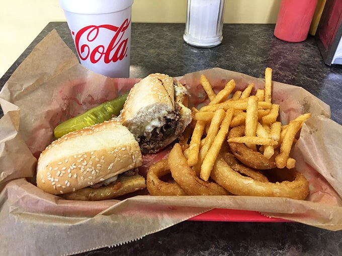 This isn't just a sandwich—it's architecture. The structural integrity of this Philly cheesesteak deserves an engineering award, while the flavor deserves a standing ovation.