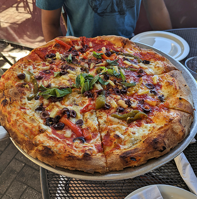 Pizza perfection doesn't happen by accident. That beautifully blistered crust with its constellation of toppings is coal-fired magic in action.