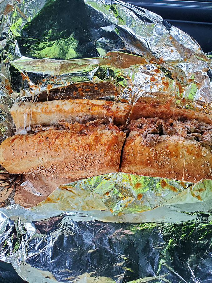 The pizza steak unwrapped is like opening a present you didn't know you wanted but suddenly can't live without.