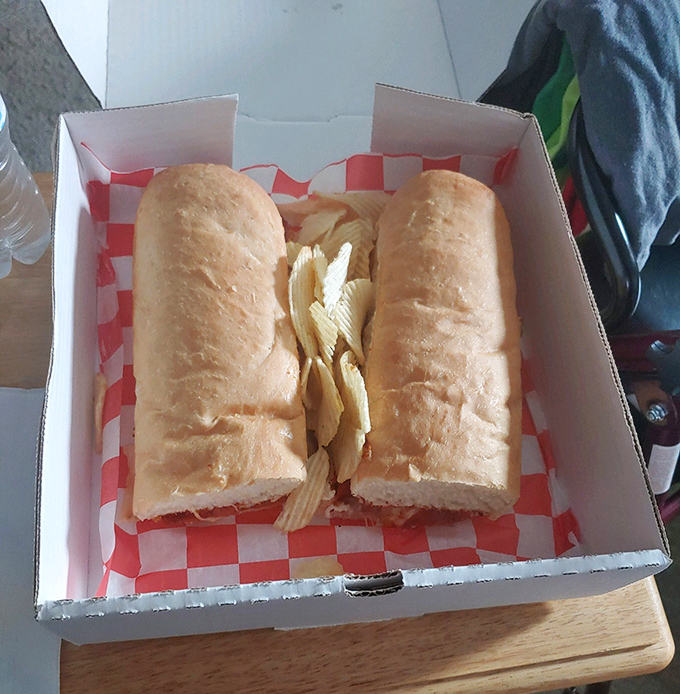 Not all heroes wear capes; some come in bread form. This sandwich isn't just lunch&mdash;it's an architectural marvel of carbs and chips. 