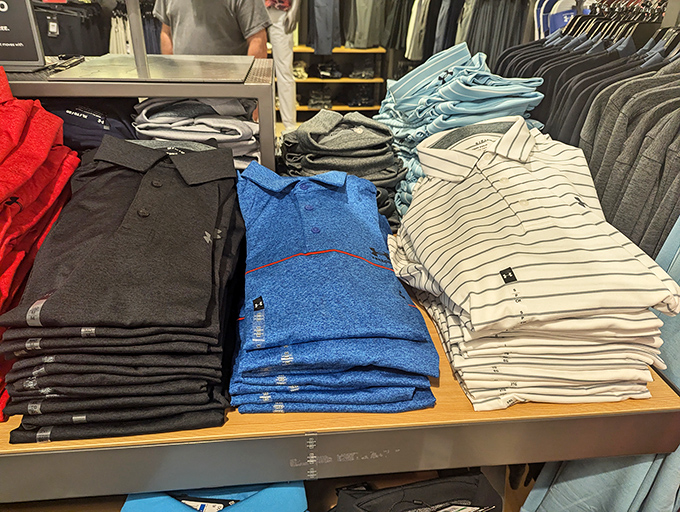 Folded perfection in every shade, because nothing says "I've got my life together" like color-coordinated polo shirts.