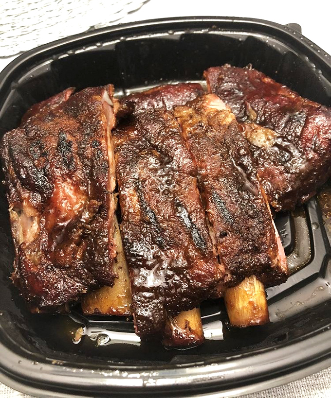 These ribs don't just fall off the bone &ndash; they maintain that perfect competition texture that makes you work just enough to feel accomplished.