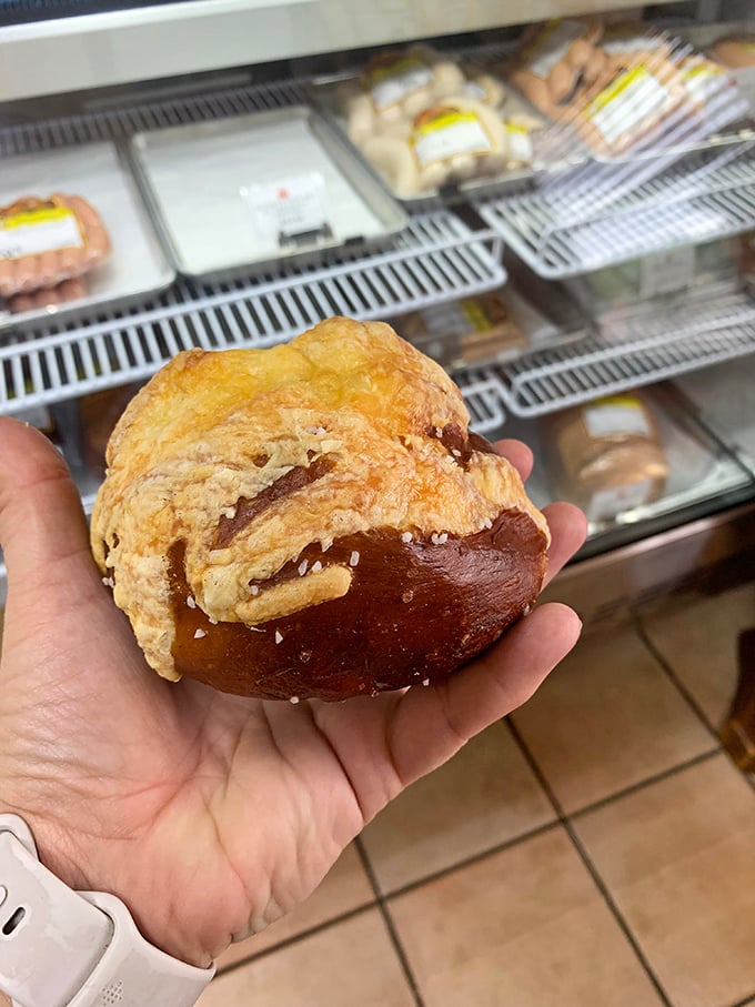 The pretzel roll sits in hand like a small, perfect planet&mdash;dense, chewy universe of salt and satisfaction.