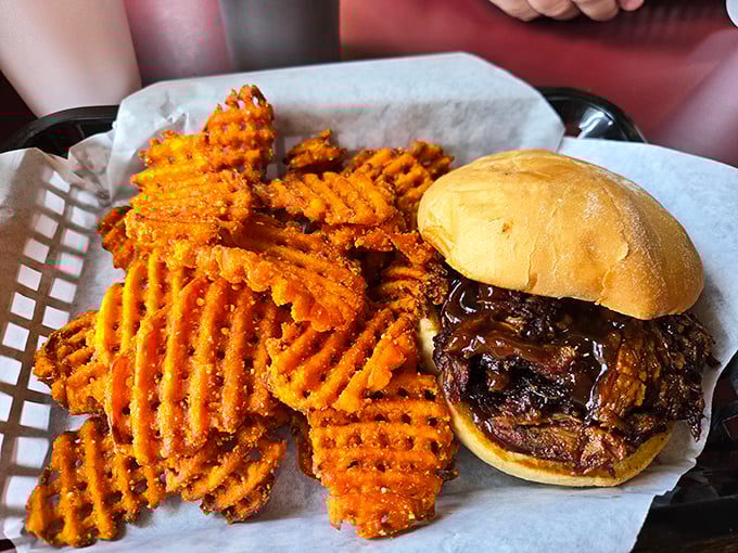 The pulled pork sandwich with waffle fries &ndash; a partnership more perfect than Astaire and Rogers, with better seasoning. 