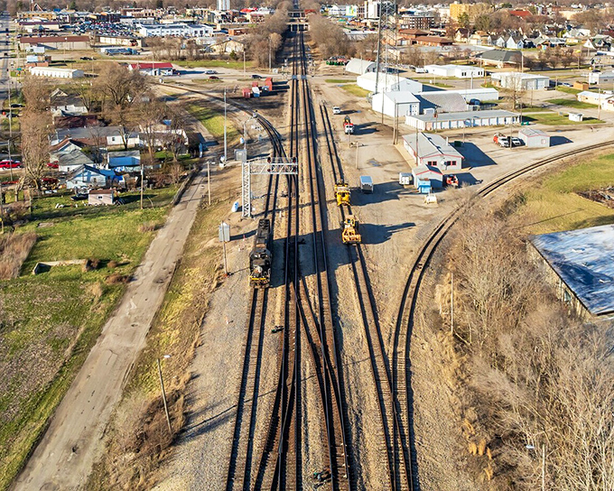 Railroad tracks stretch toward the horizon, a reminder of Mattoon's industrial heritage and current role as a transportation crossroads.
