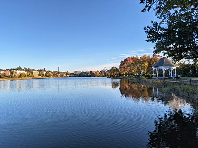 Exeter's waterfront reflects autumn's fiery palette with mirror-like precision&mdash;Mother Nature showing off her photography skills without an Instagram filter in sight.