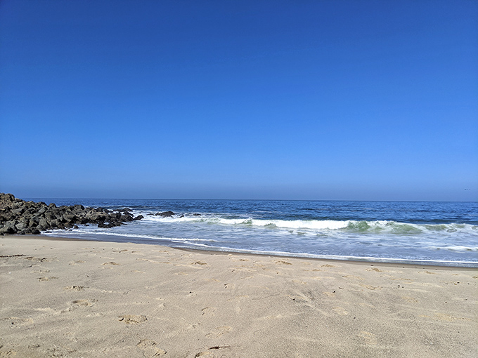No umbrellas, no volleyball nets, no problem. This stretch of sand offers the increasingly rare luxury of hearing nothing but waves.