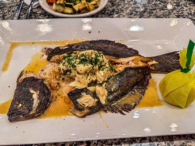 When a fish is prepared this beautifully, you almost feel guilty eating it. Almost. That crispy skin is the seafood equivalent of potato chips.