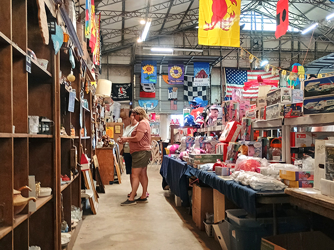 Shoppers navigate the narrow aisles like archaeologists, carefully examining artifacts from decades past, each item telling its own story.