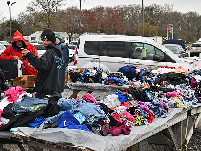 The outdoor bargain hunt continues rain or shine. These shoppers know the thrill of the find is worth braving any weather.