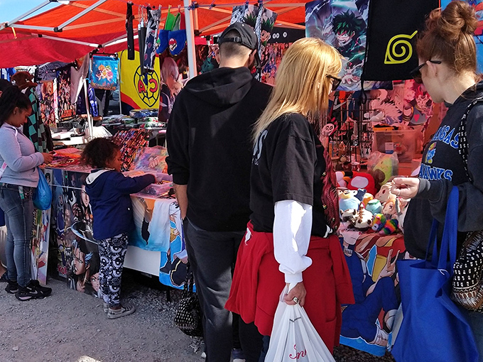 Treasure hunters browse anime-themed merchandise with the focused intensity of archaeologists discovering a new tomb.