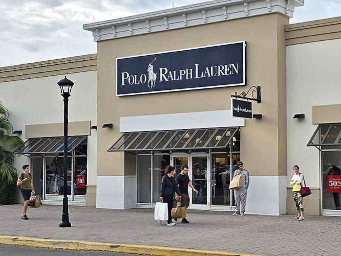 The Ralph Lauren storefront welcomes shoppers with its classic navy signage – like a preppy beacon in a sea of retail options.