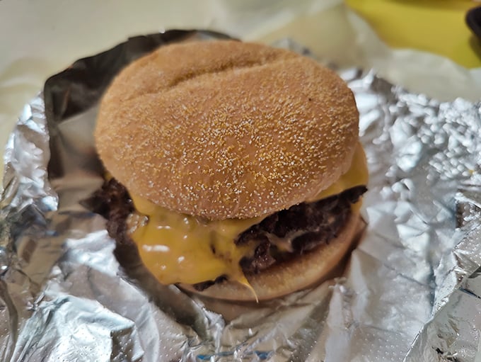 That melted cheese cascading down the burger patty isn't just food&mdash;it's edible sunshine on a sesame seed throne.