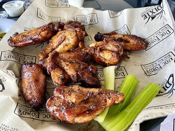 Wings that have clearly been introduced to fire and spice in the most delicious way possible. The celery sticks are just there for moral support.