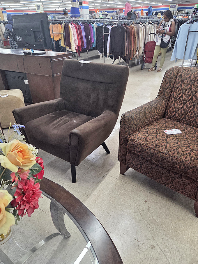 Modern meets vintage in the seating section. That brown chair isn't just furniture&mdash;it's your next reading nook's best friend.