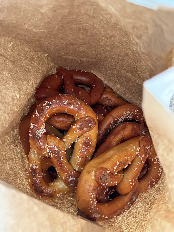 A brown paper bag reveals the motherlode&mdash;hand-twisted pretzels with that distinctive mahogany sheen and perfect salt distribution that makes taste buds sing.