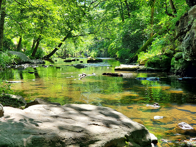 Summer transforms this spot into Alabama's best-kept secret swimming hole, complete with emerald green waters.