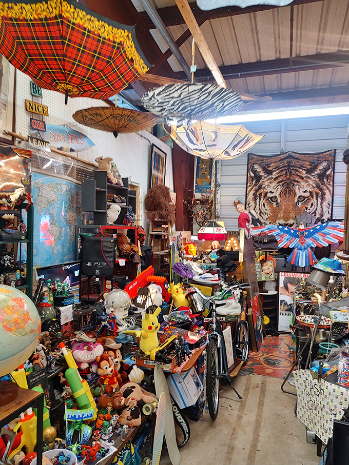 Organized chaos at its finest. This booth is what happens when your childhood toy box explodes and gets curated by a nostalgic hoarder with excellent taste.