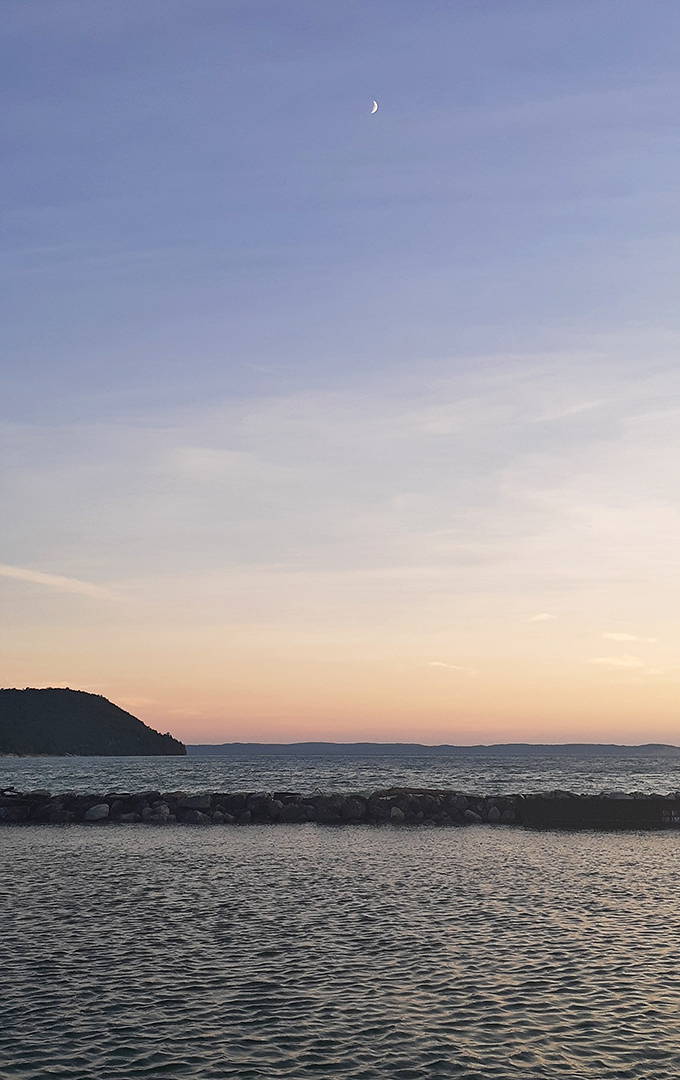 Evening light paints the sky in colors that would make sunset photographers weep with professional envy.