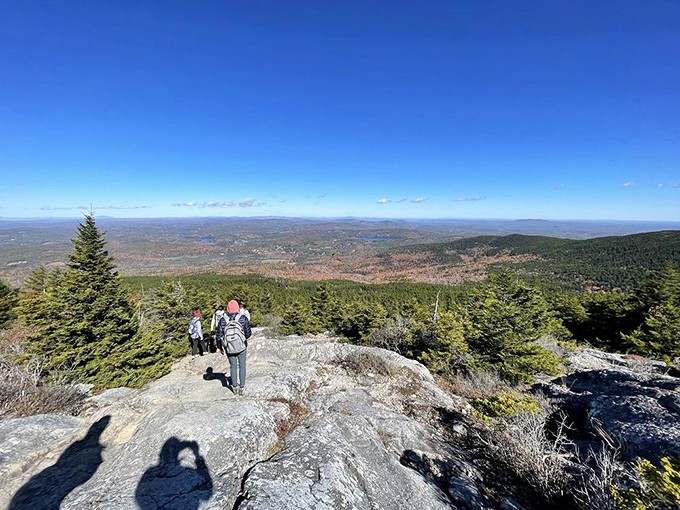 Standing on top of New Hampshire with clouds for company. On clear days, six states wave hello from this breathtaking vantage point.