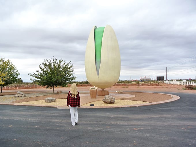 Scale becomes apparent when humans meet monument&mdash;this massive nut sculpture turns every visitor into an impromptu photographer.