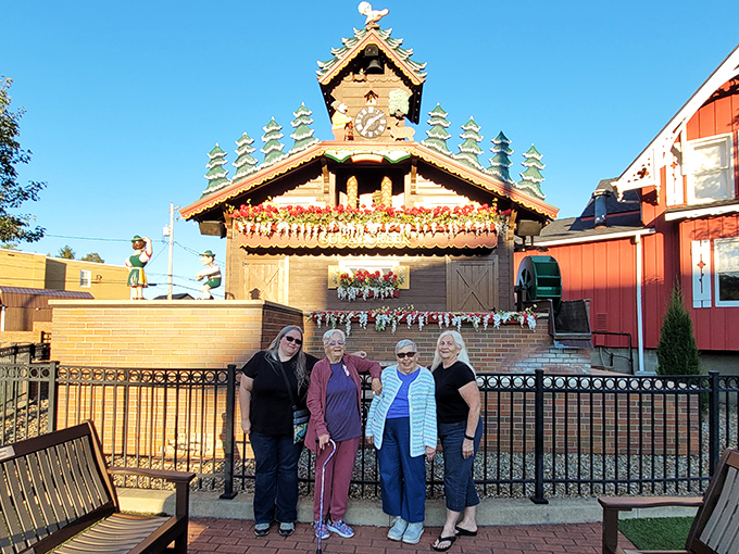 Visitors gather for the obligatory "we were here" photo, creating memories that will outlast any souvenir refrigerator magnet.