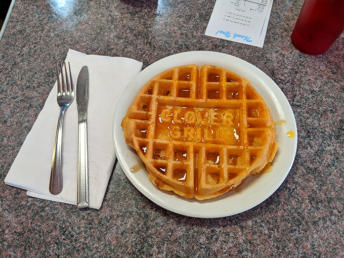 The waffle that brands itself! Golden, crisp, and proudly displaying its birthplace – it's not just breakfast, it's edible marketing genius.