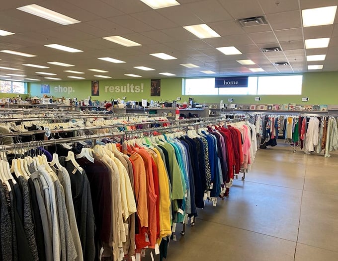 The women's clothing section offers a rainbow of possibilities. Fashion history hangs here, organized by color like an artist's palette.