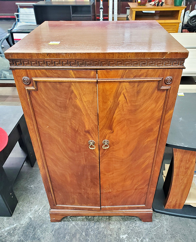 This isn't just a cabinet&mdash;it's a time machine with doors. Imagine the dinner parties it's witnessed and the stories it could tell.