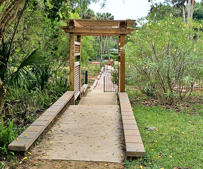 Step through this wooden pergola and enter what feels like a secret garden chapter from a Florida fairytale.