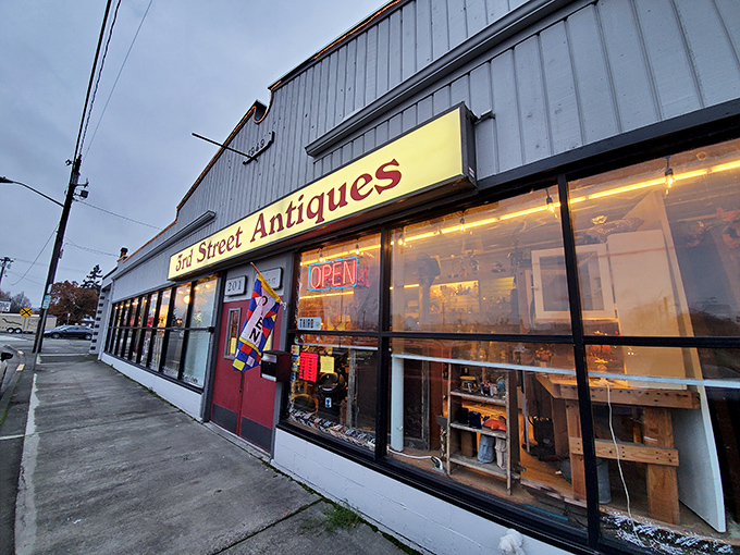 3rd Street Antiques' bright red door beckons like a portal to simpler times. Just try walking past without peeking inside!