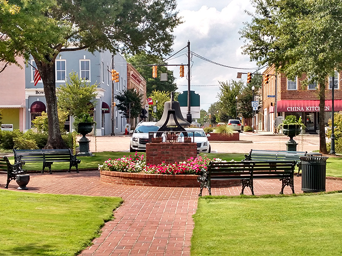 Abbeville's town square looks like it's waiting for a Norman Rockwell to paint it. The flower beds add pops of color to this brick-paved gathering spot.