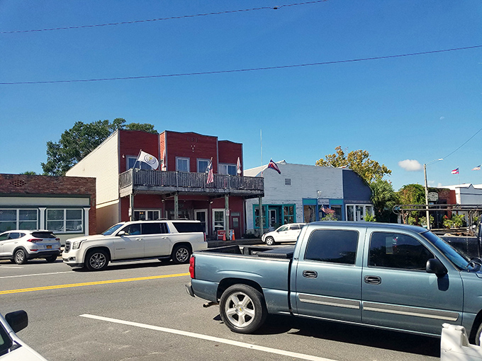 Apalachicola's authentic main street buzzes with small-town energy where local businesses and friendly faces welcome visitors like old friends.