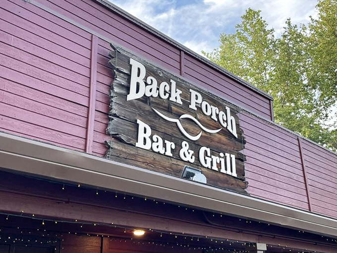 Back Porch Bar & Grill's burgundy exterior feels like coming home. This Jacksonville gem promises comfort food with a smoky twist.