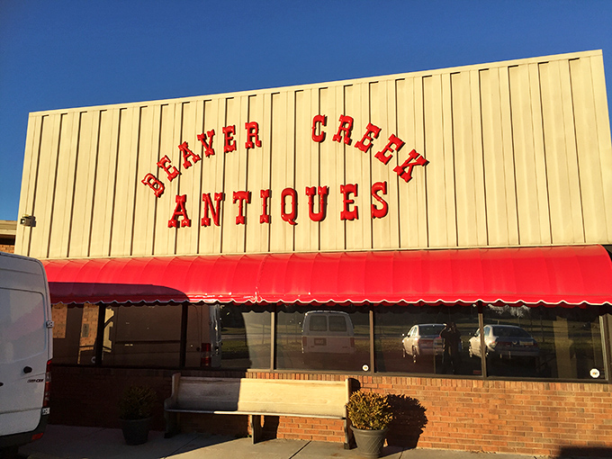 Beaver Creek's bold red lettering against cream siding promises a no-nonsense approach to serious antiquing. Let the hunt begin!