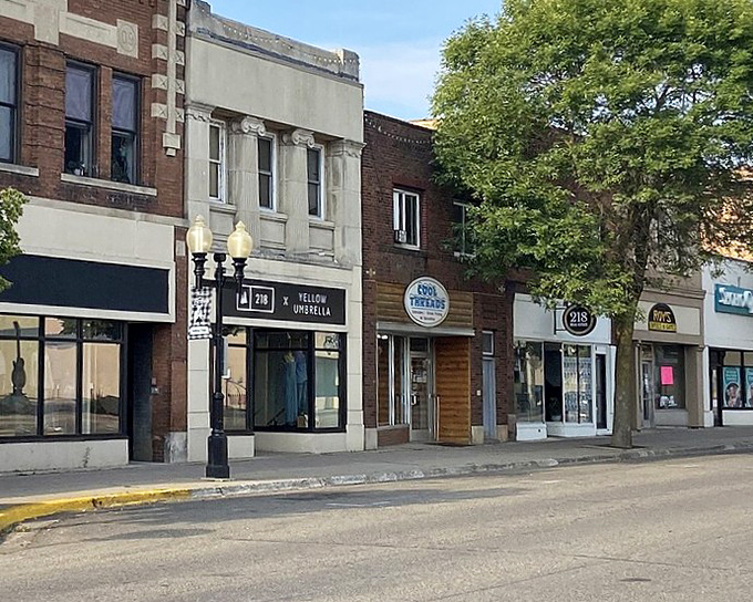 These storefronts have welcomed generations of neighbors, each brick holding memories of community gatherings.