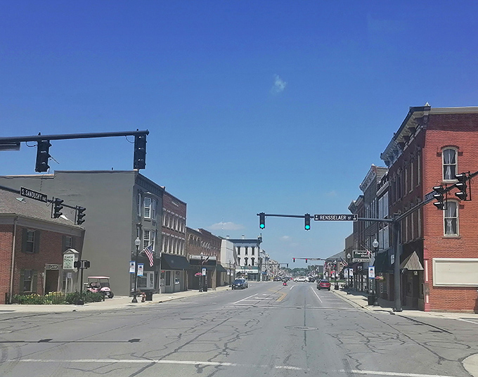 Historic buildings line the street like old friends catching up, each with tales to tell.