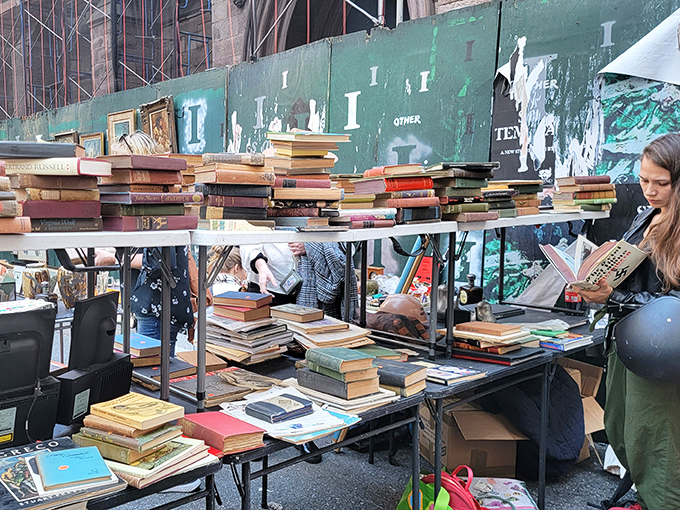 Books stacked like literary skyscrapers invite readers to discover their next great adventure.