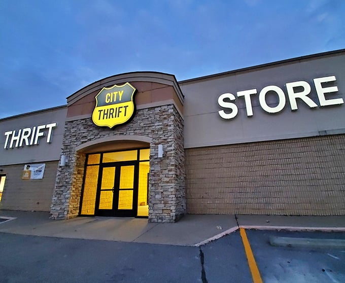 City Thrift's stone entrance glows like a portal to bargain dimensions. What vintage wonders await behind those doors?