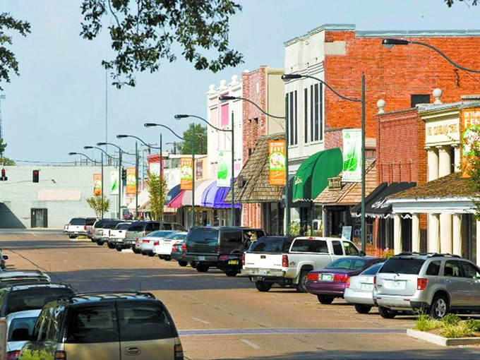 Delta town vibes meet college energy where murals tell stories and main streets still matter.